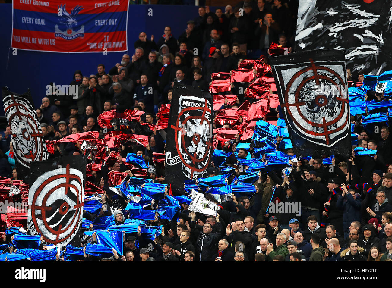 Crystal palace fans hold banners in stands hi-res stock photography and ...