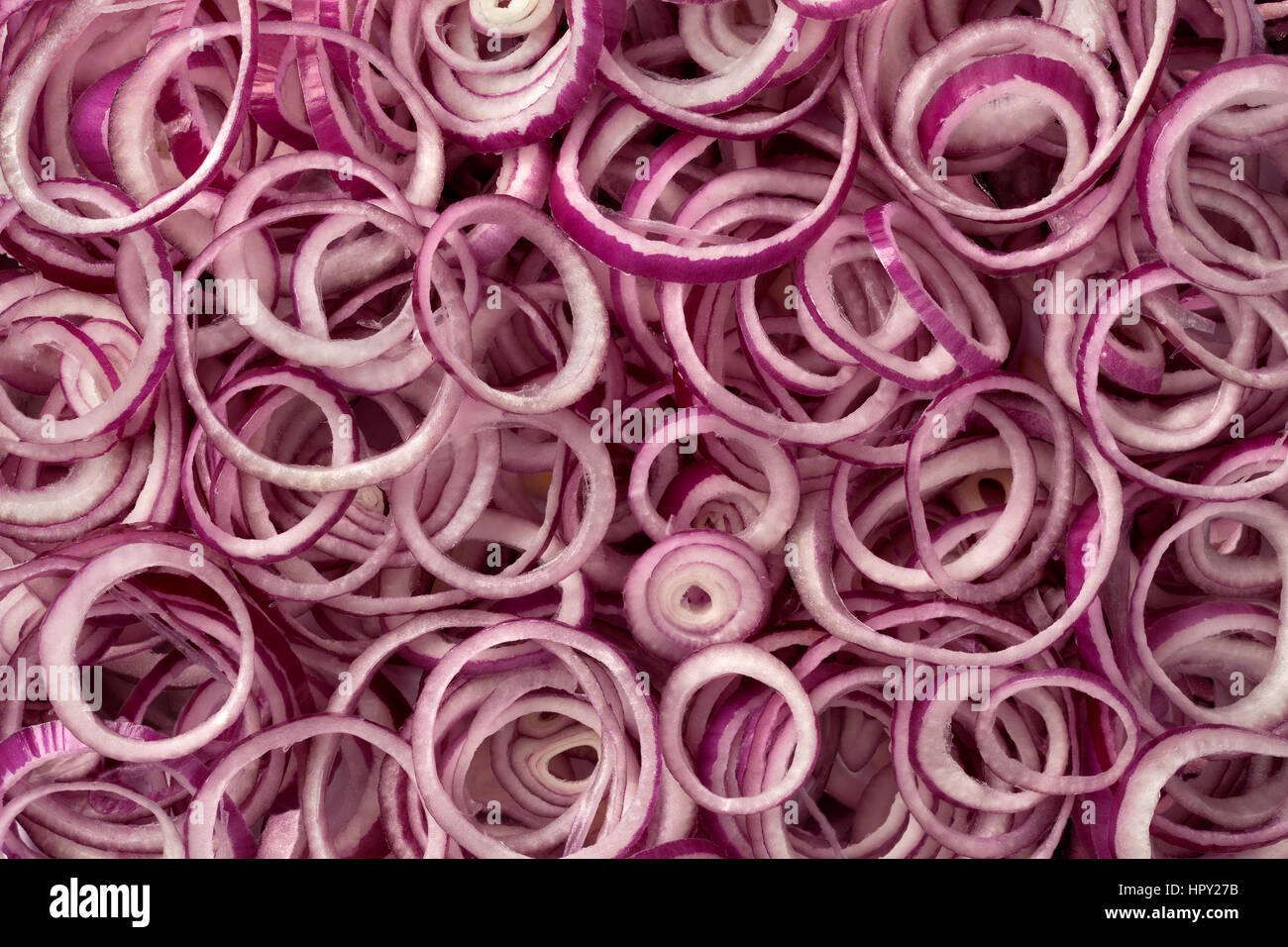 Fresh raw red onion rings full frame Stock Photo - Alamy