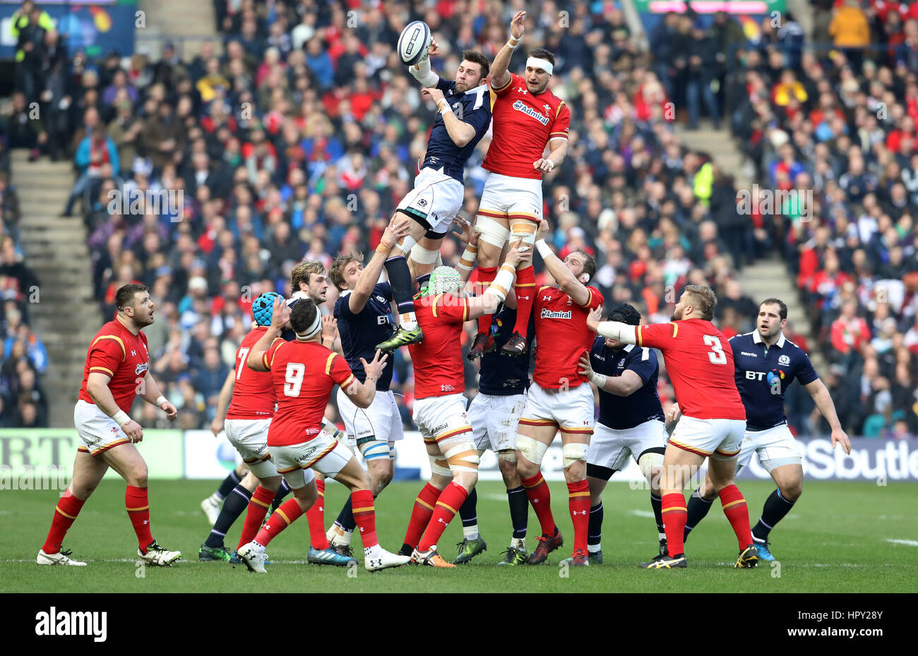 Scotland's Ryan Wilson and Wales' Jake Bell contest a lineout during ...