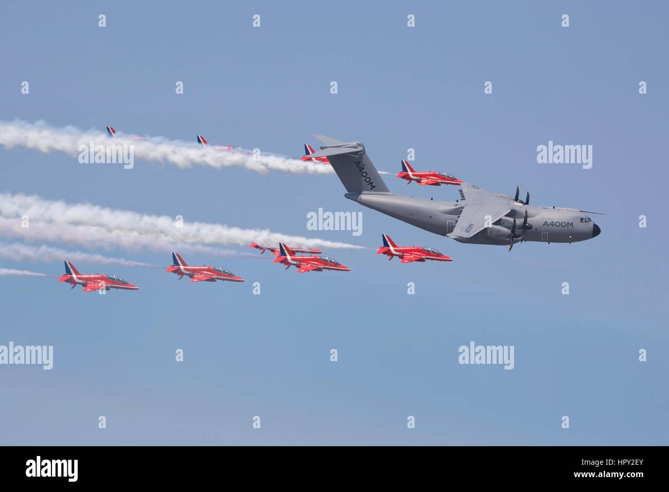 Airbus A400M Atlas flying in formation with the Red Arrows Stock Photo ...