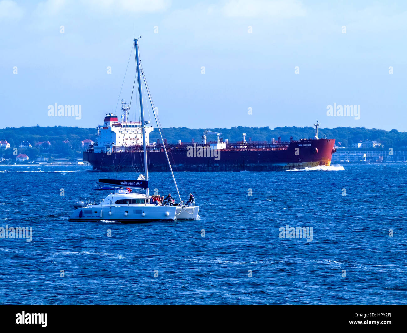 Oil tanker passing catamaran hi-res stock photography and images - Alamy