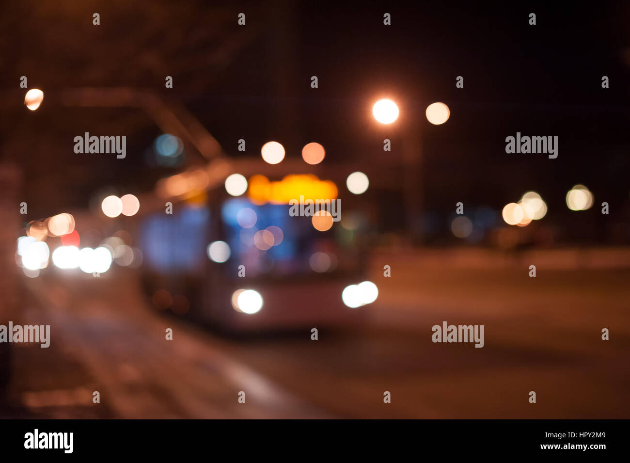 trolley bus on the night city street Stock Photo - Alamy