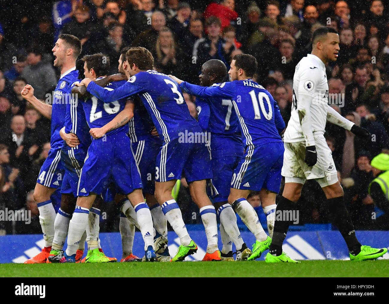 Chelsea's Pedro (hidden) celebrates scoring his side's second goal of ...