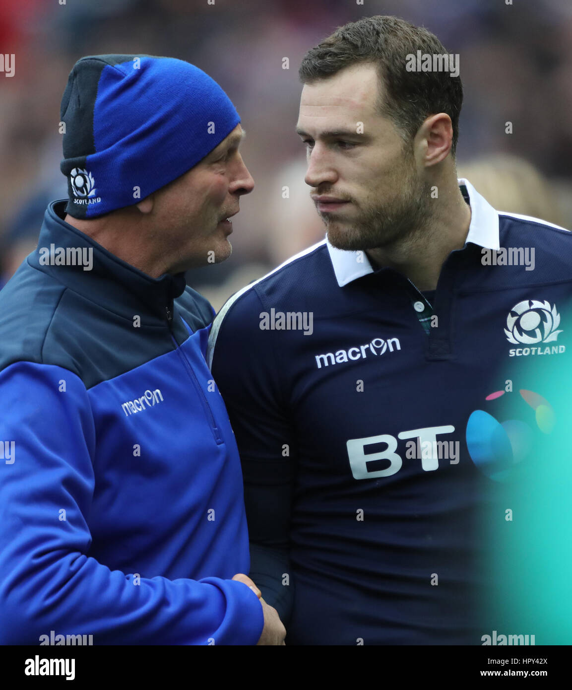 Scotland coach Vern Cotter shakes hands with try scorer Tim Visser at ...