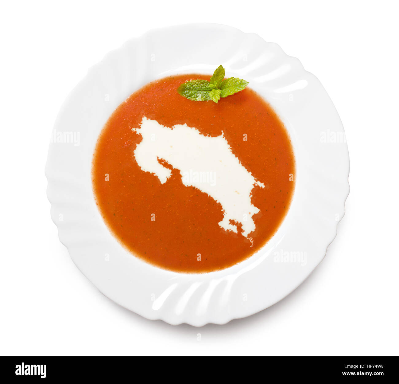 A plate tomato soup with cream in the shape of Costa Rica.(series Stock ...