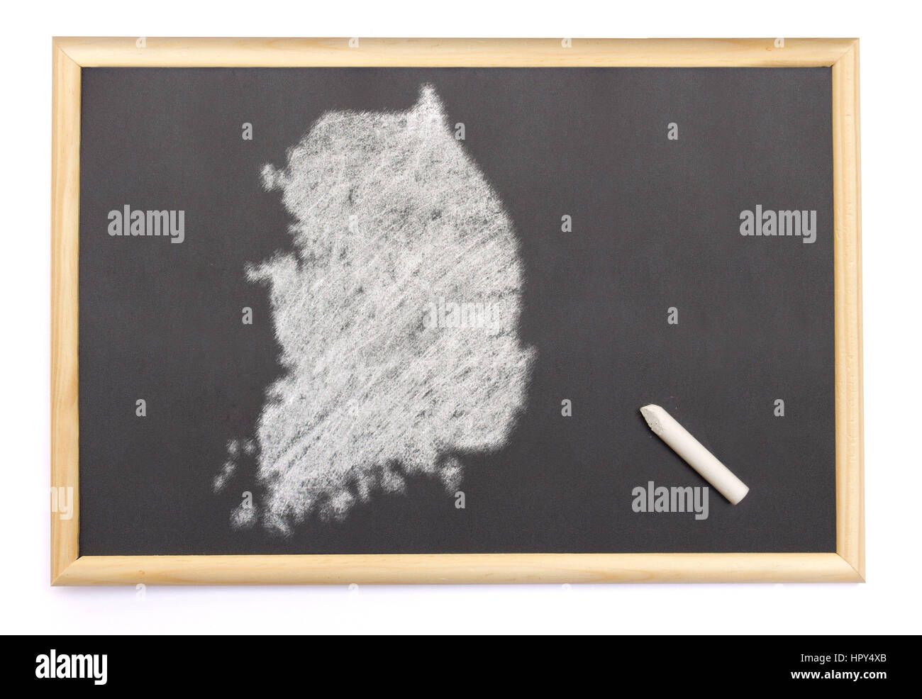Blackboard with a chalk and the shape of South Korea drawn onto ...