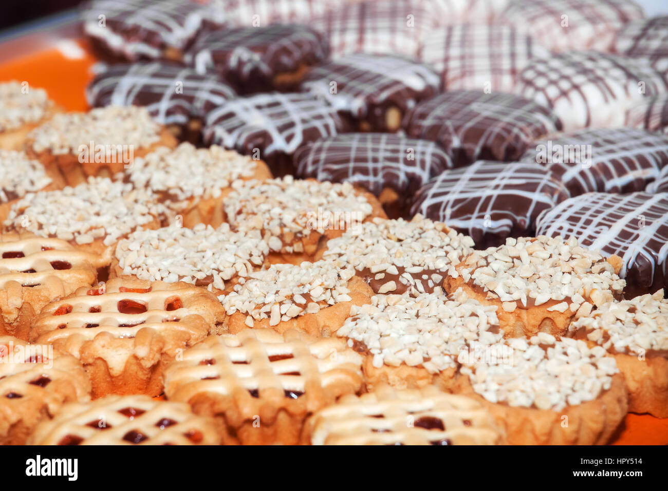 Background of different cookies. Pattern of many cookies Stock Photo ...