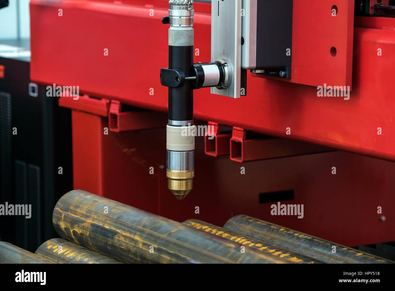 Laser metal sheet cutting machine close up processing Stock Photo - Alamy