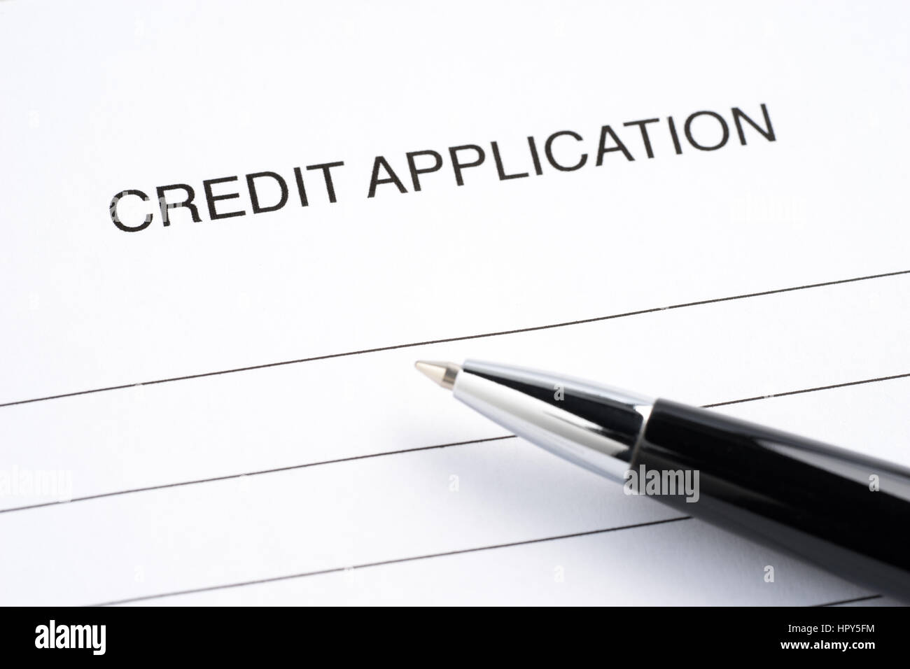 Blank credit application form and pen Stock Photo - Alamy