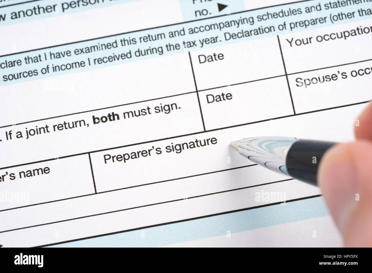 Tax signature hi-res stock photography and images - Alamy