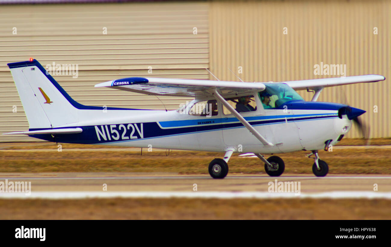 a small plane landing Stock Photo - Alamy