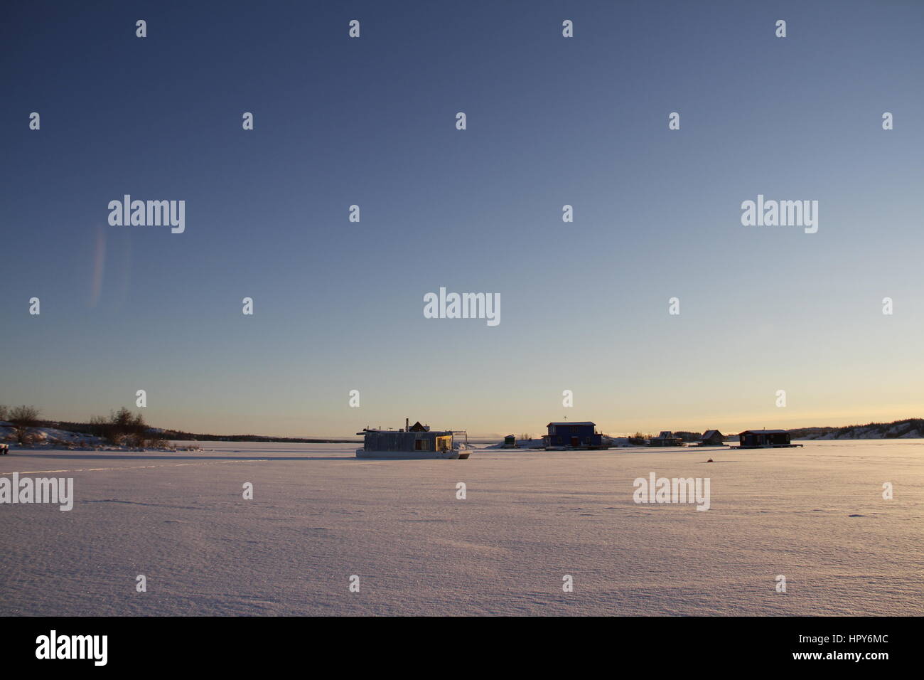 Houseboats on Yellowknife Bay in Great Slave Lake at sunset Stock Photo ...
