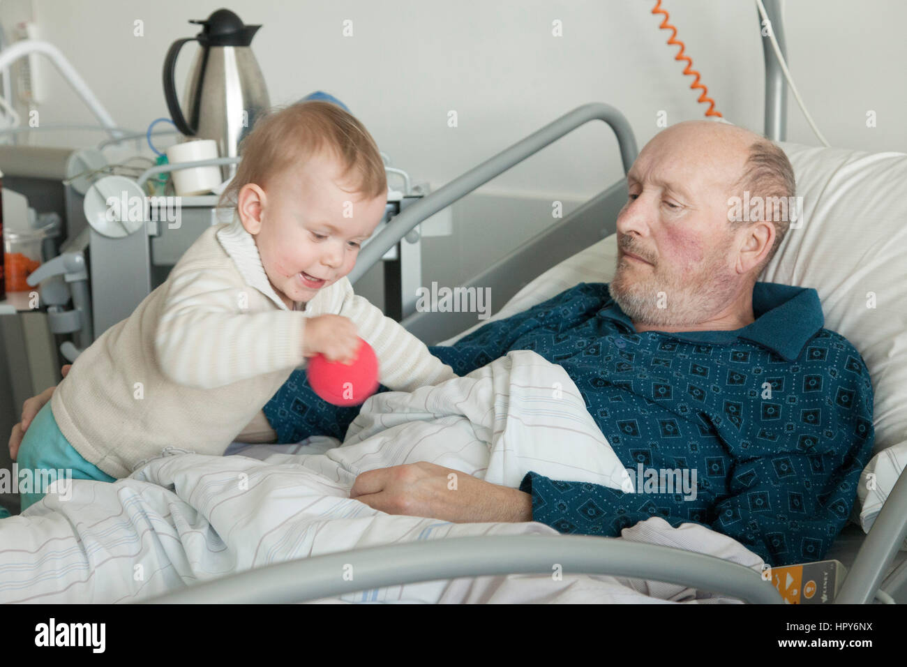 Male hospital patient pressing hi-res stock photography and images - Alamy