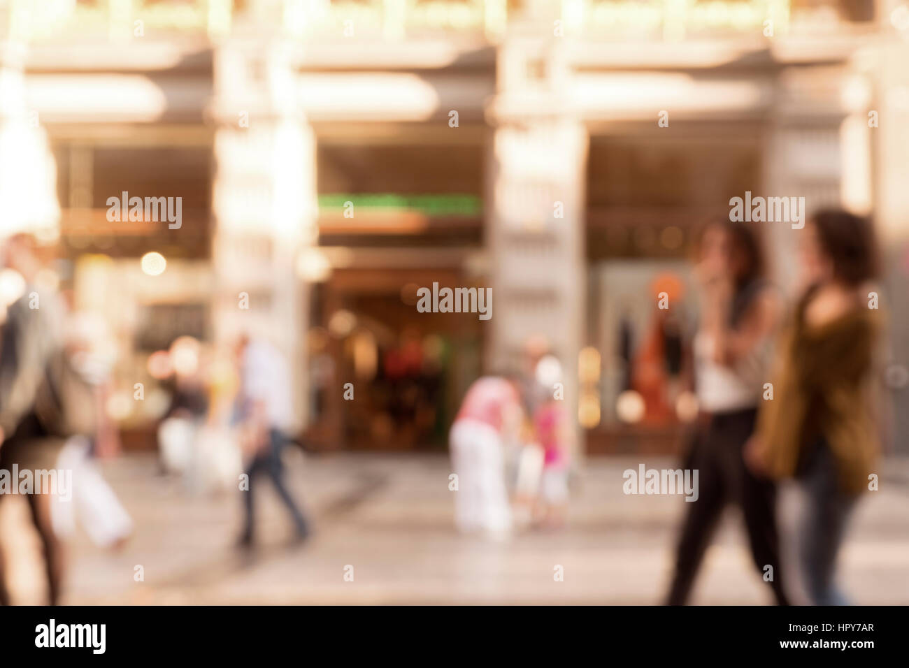 Busy shopping street with blurred focus Stock Photo - Alamy