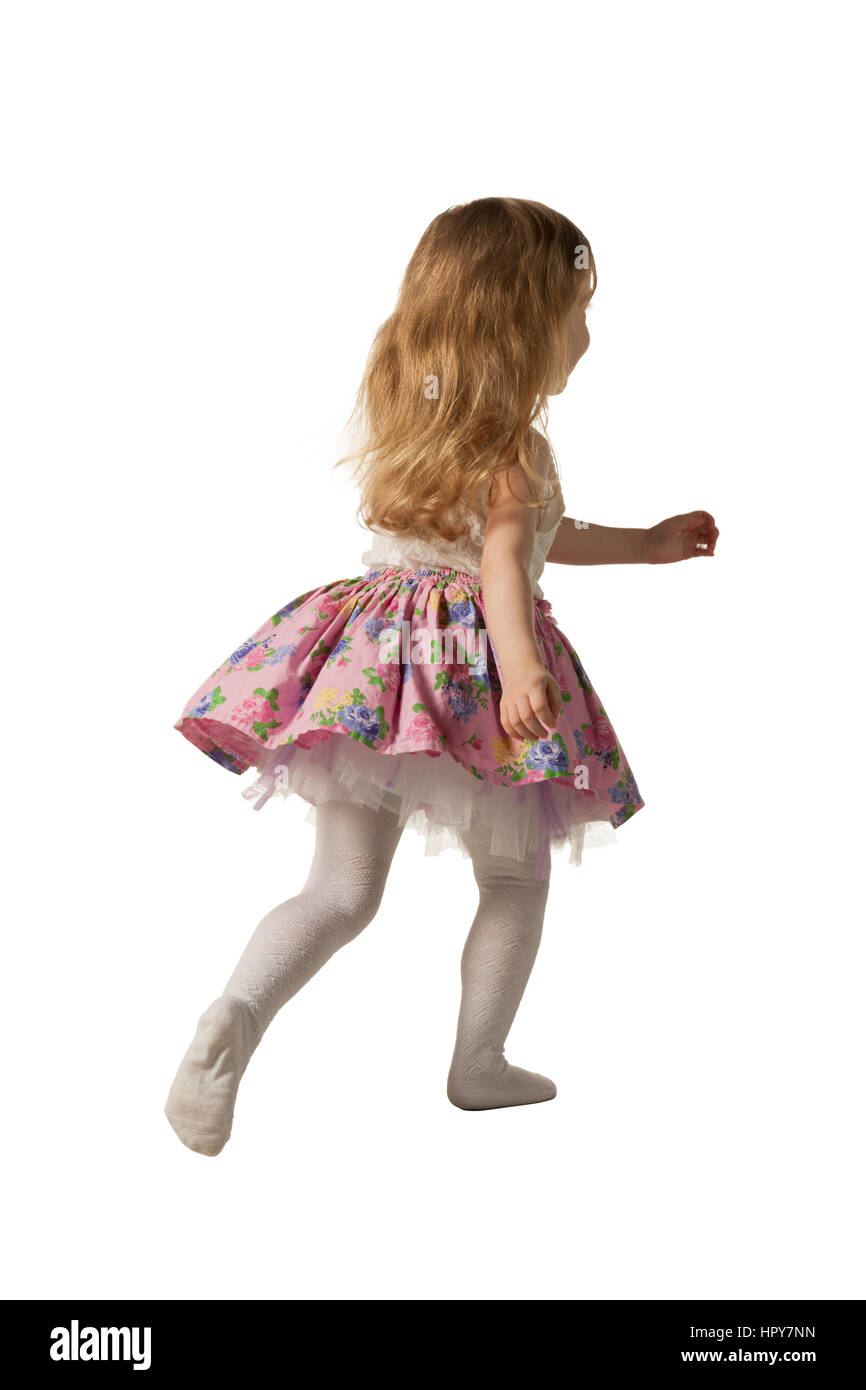 Little cute girl jumping, running, dancing, having fun. Isolated on ...