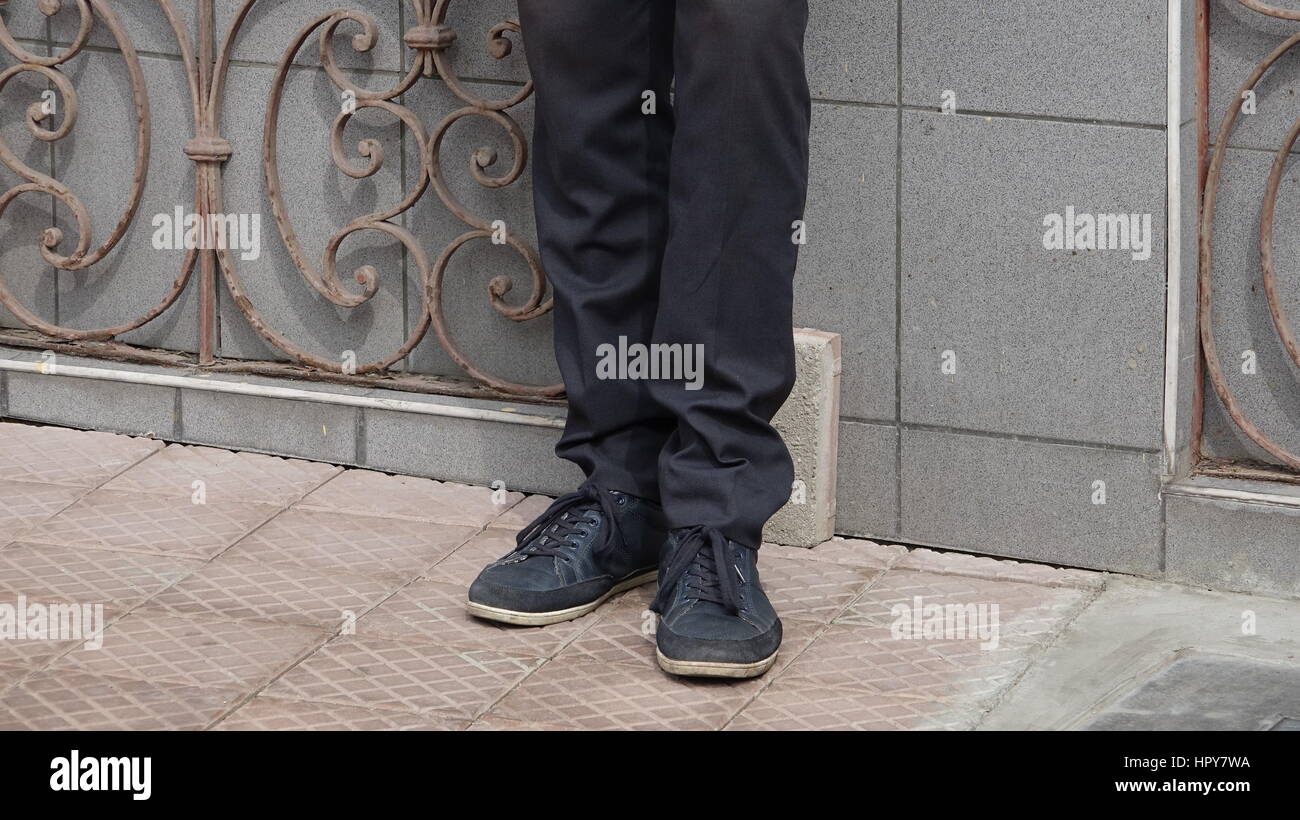 Feet And Legs Of Man Standing Stock Photo - Alamy