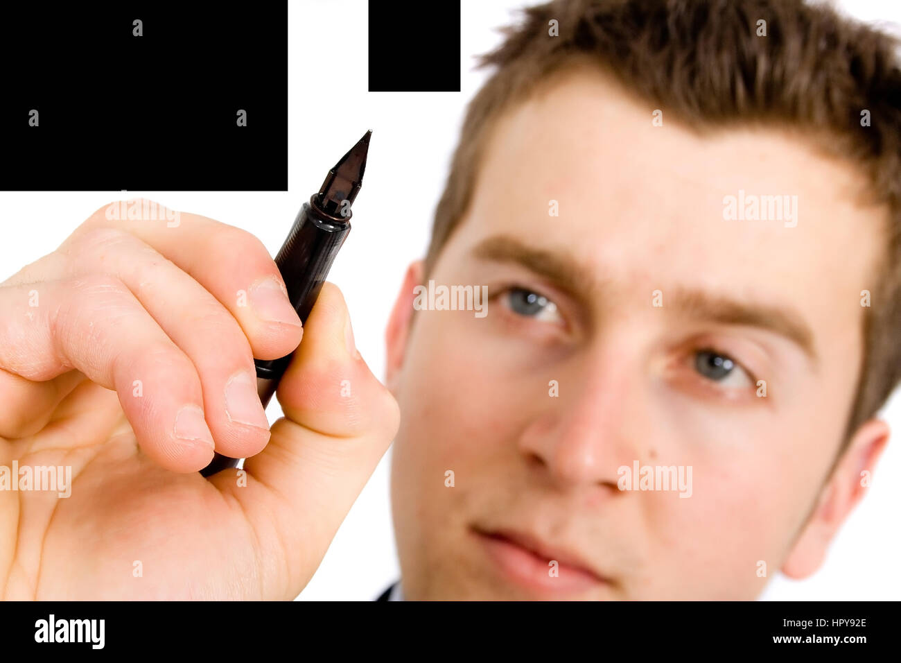 business plan - man with pen over a white background writing something ...