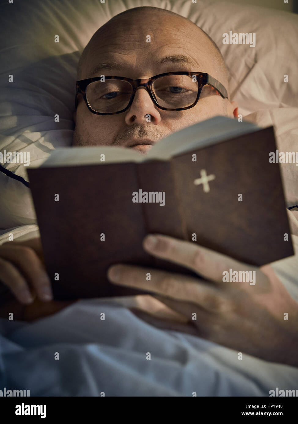 Resting reading bible hi-res stock photography and images - Alamy