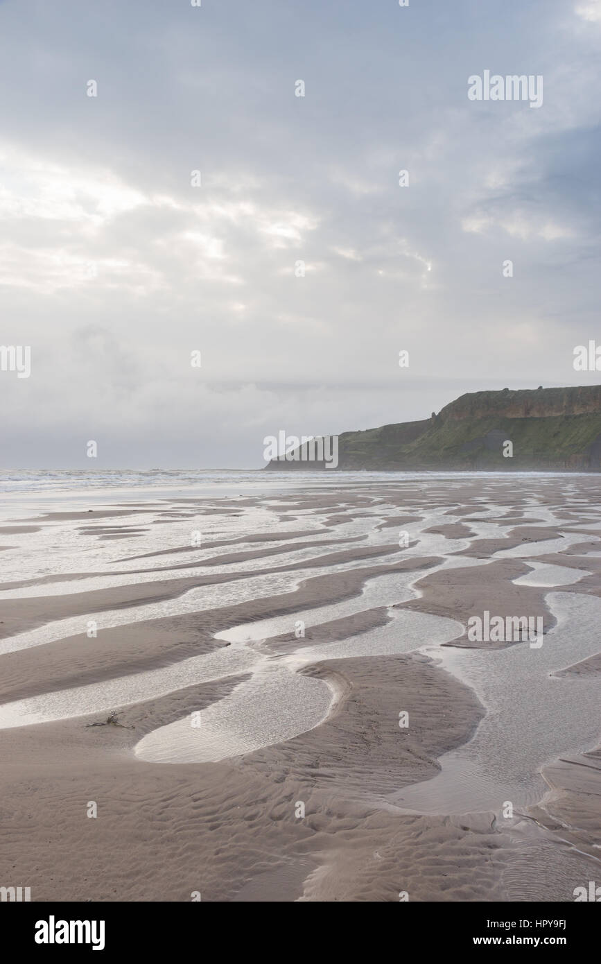 Cayton bay beach including Lebberston cliff near Scarborough, North ...