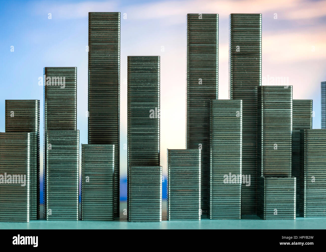 Staples arranged to form city skyline on a sunset background Stock ...