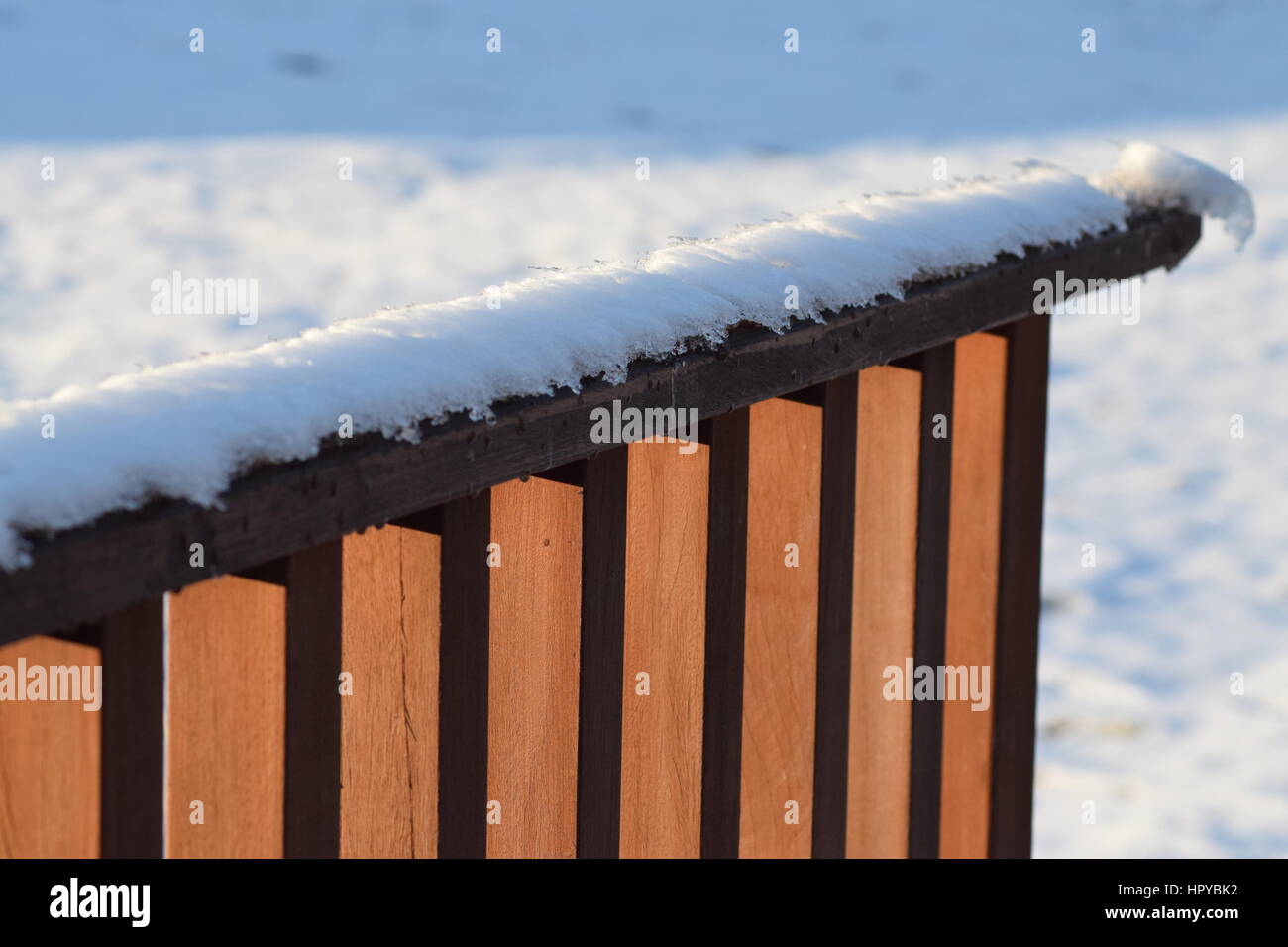 Wooden bridge with snow on sunny day Stock Photo - Alamy