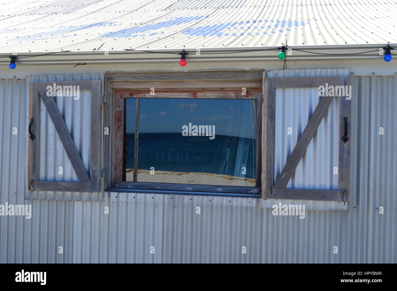 Reflection through the window of beach Stock Photo - Alamy