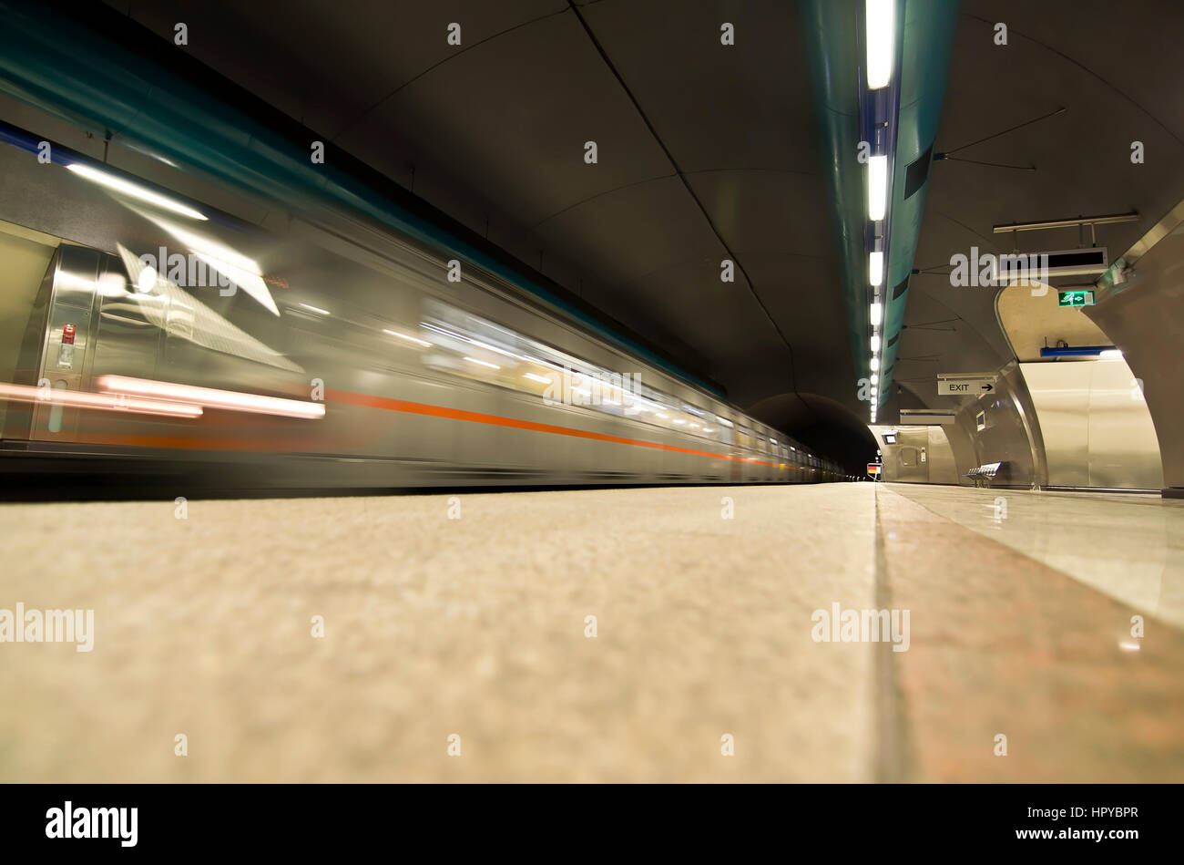 european metro subway station - moving metro train Stock Photo - Alamy