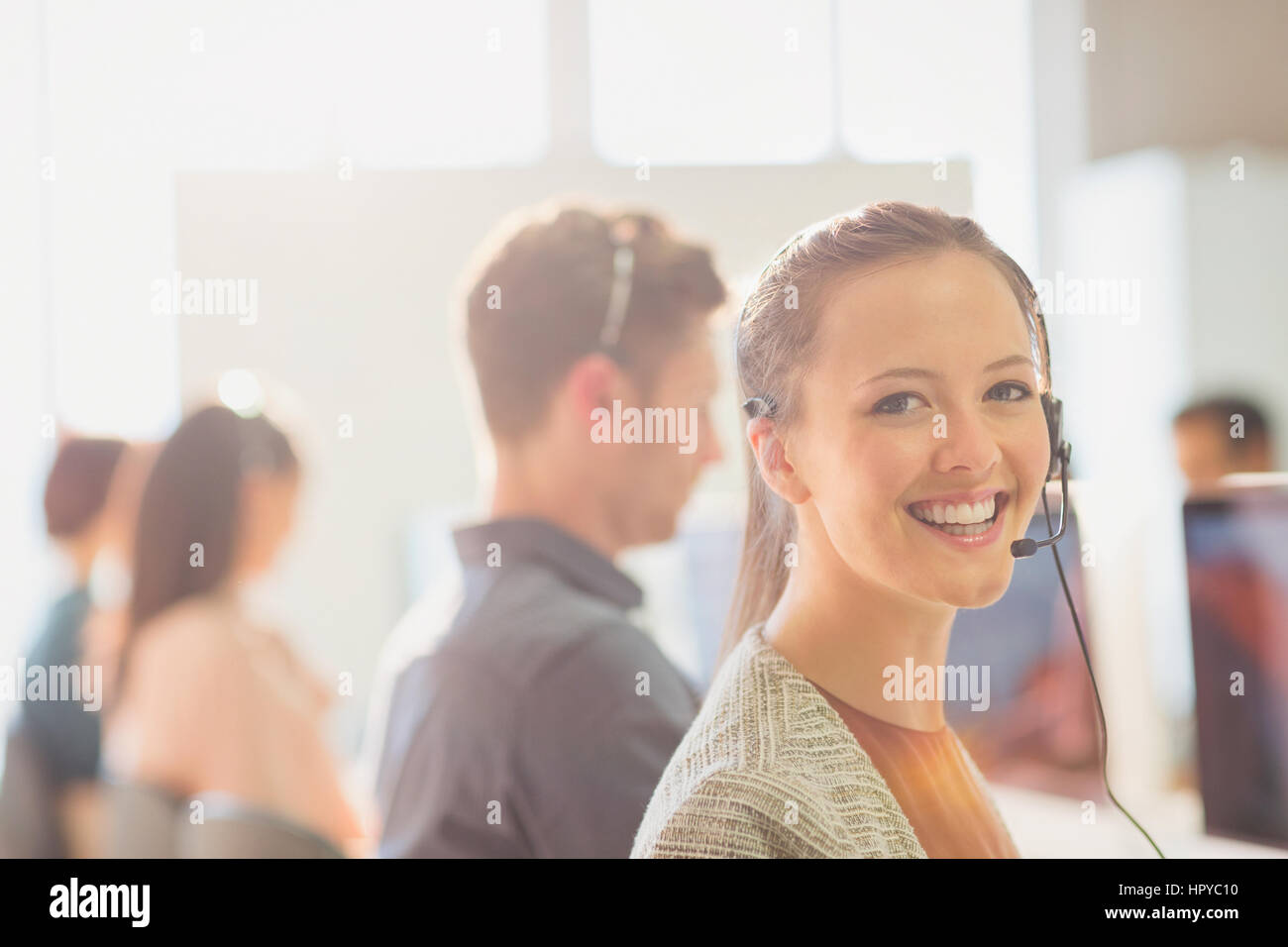 Portrait smiling female telemarketer wearing headset in office Stock ...