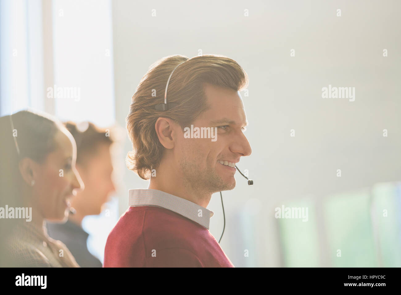 Man with telephone headset hi-res stock photography and images - Alamy