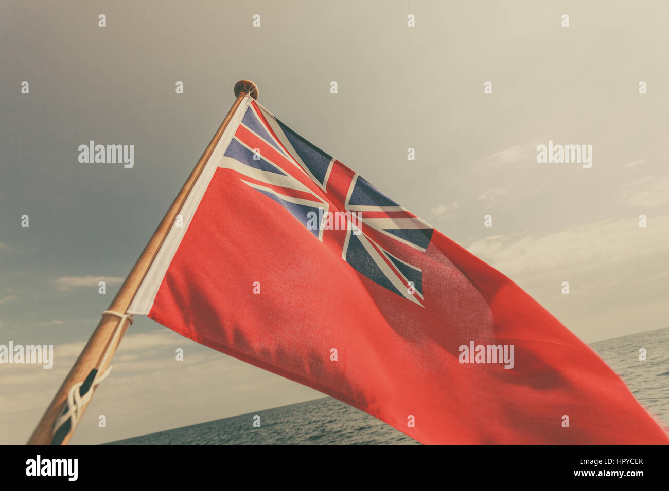 The uk red ensign the british maritime flag flown from yacht sail boat ...
