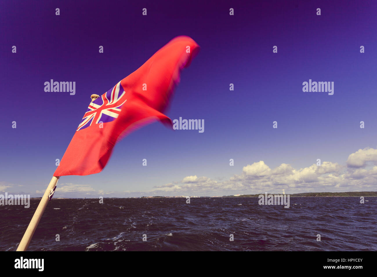 The uk red ensign the british maritime flag flown from yacht sail boat ...