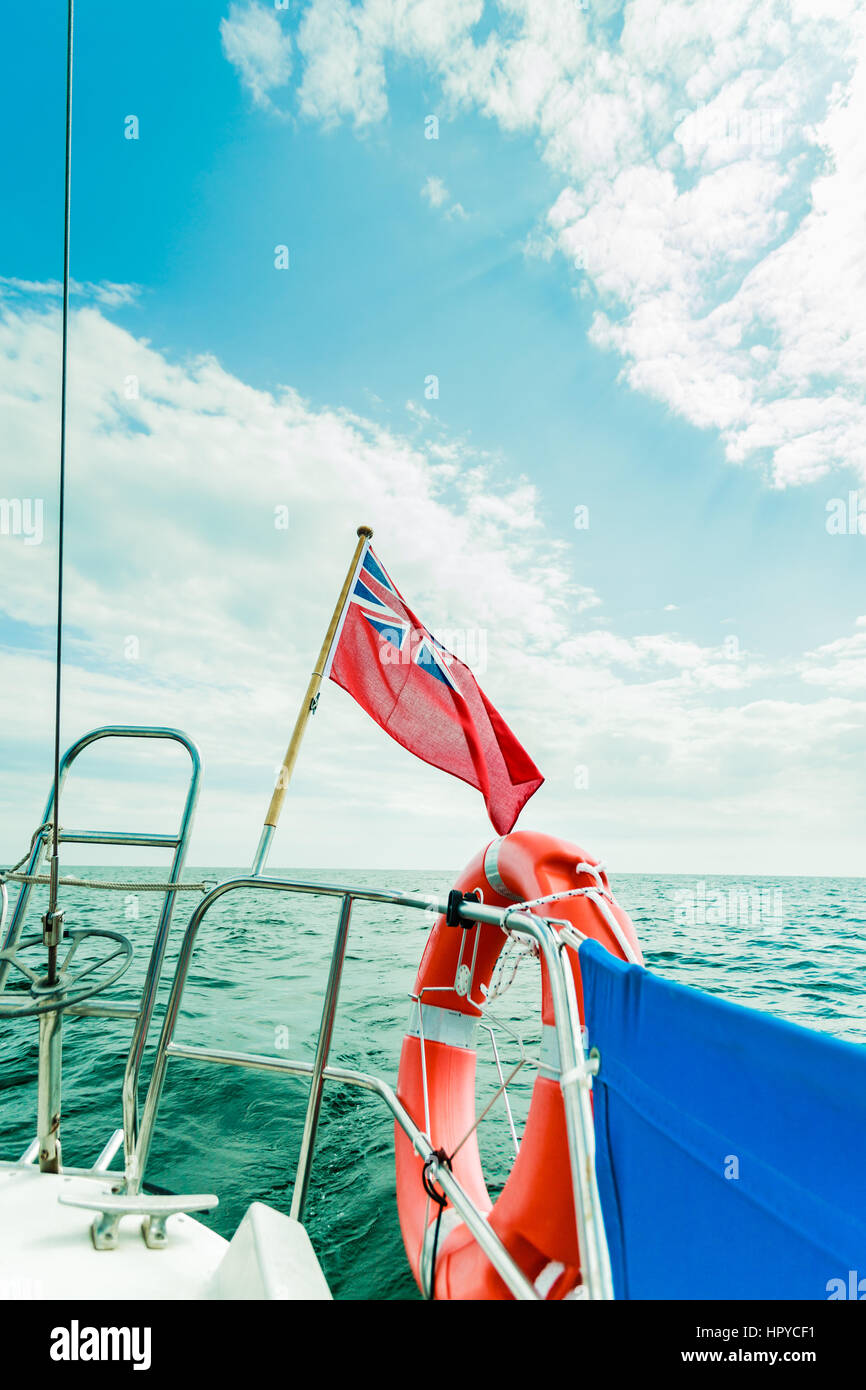 The uk red ensign the british maritime flag flown from yacht sail boat ...