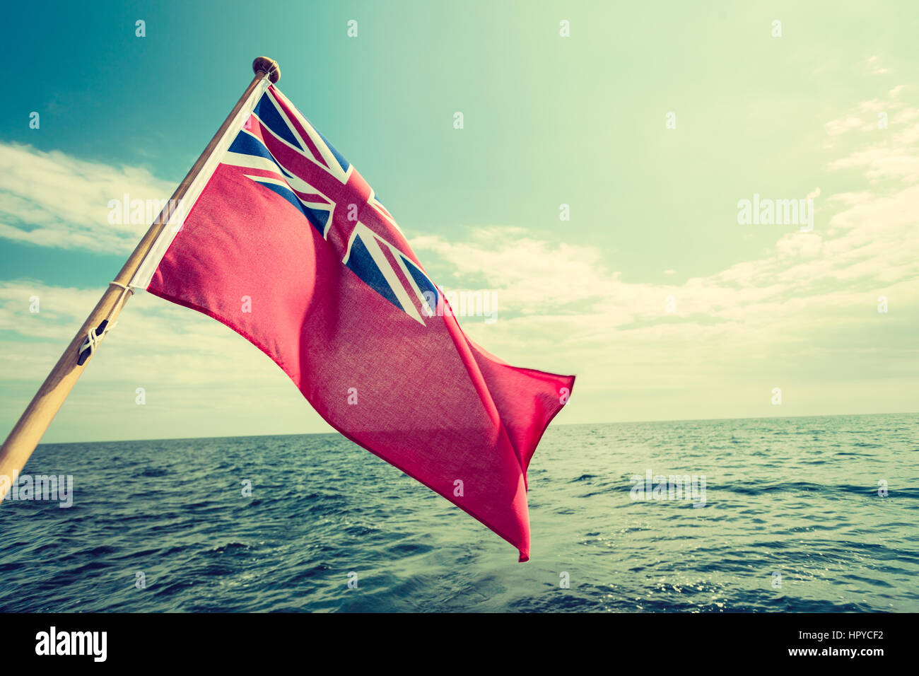 The uk red ensign the british maritime flag flown from yacht sail boat ...
