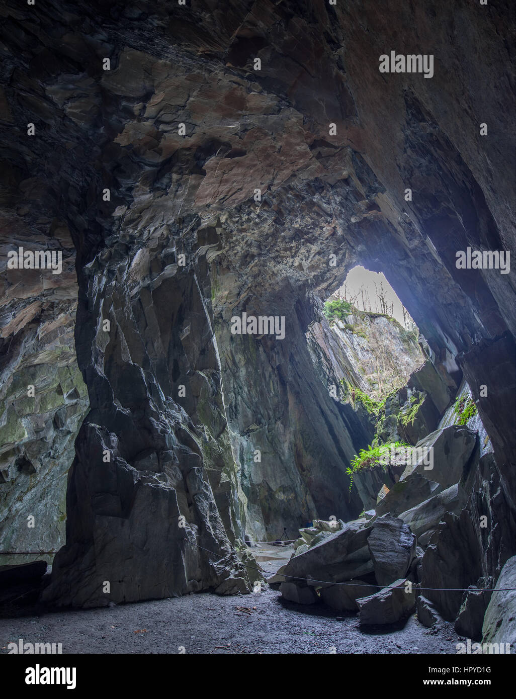 Cathedral cavern. Beautiful light falling on the central column from a ...