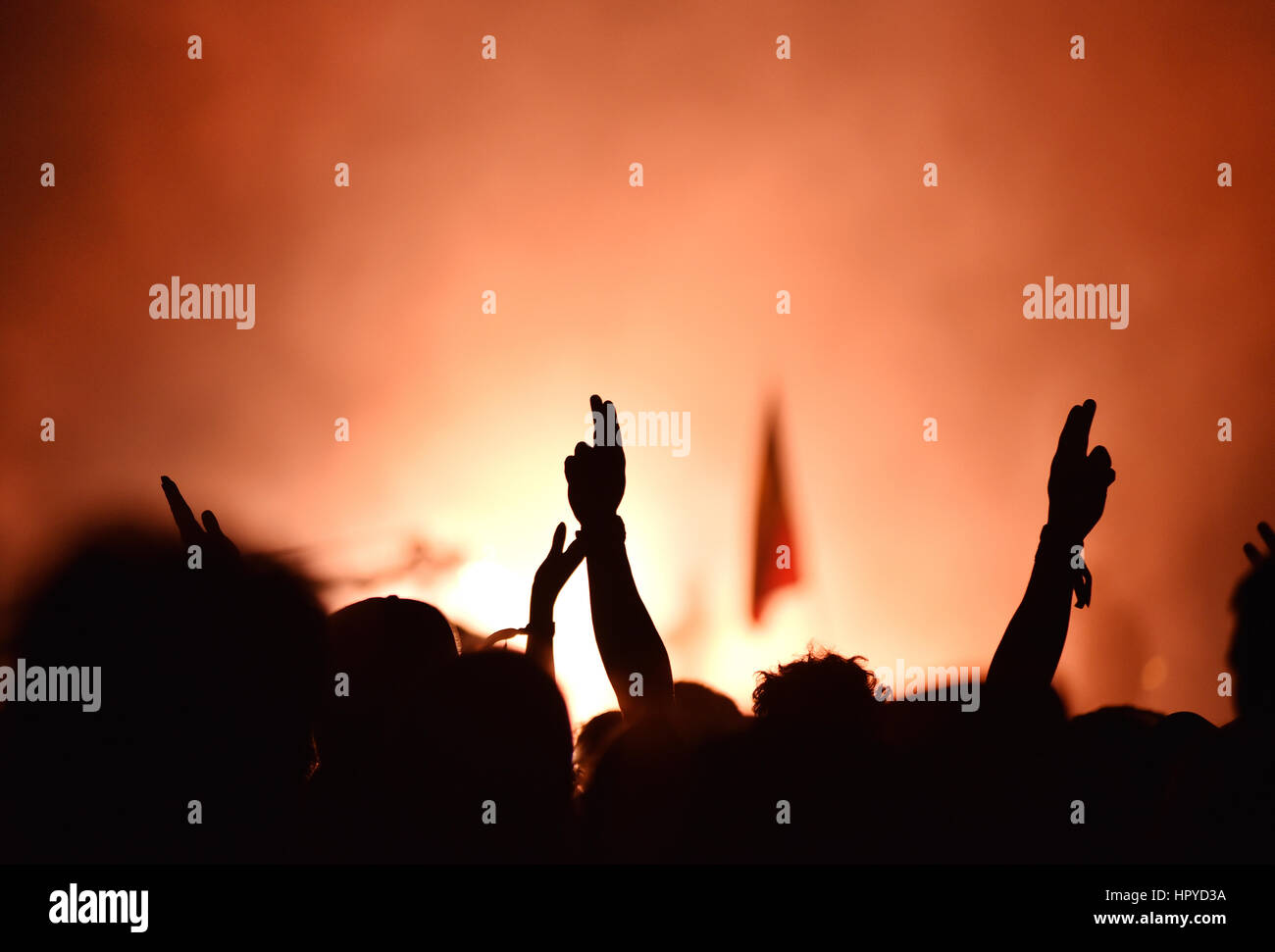 Concert crowd cheering hands up hi-res stock photography and images - Alamy
