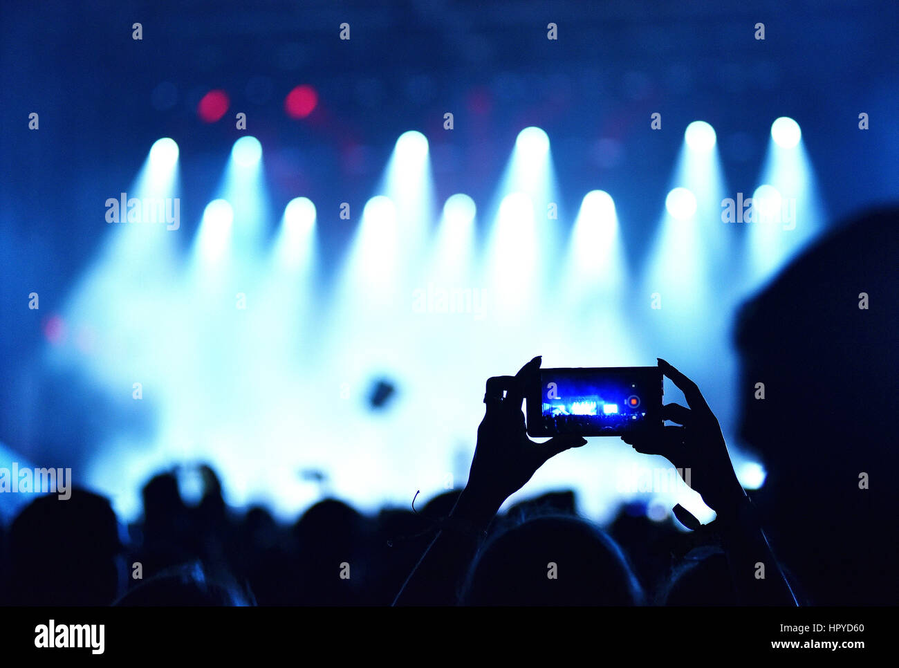 Crowd recording live concert with smart phones Stock Photo - Alamy