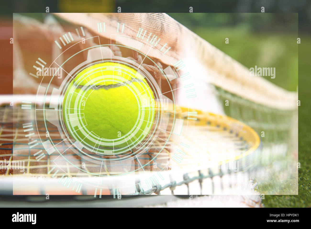 tennis ball and tennis racket on a tennis court with blurred background ...