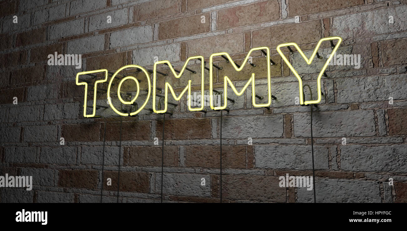 TOMMY - Glowing Neon Sign on stonework wall - 3D rendered royalty free ...