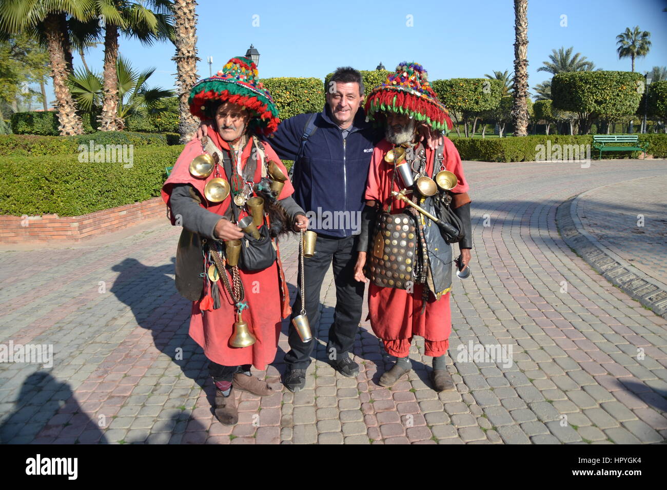 Water sellers in their traditional colorful costume, Morocco Stock ...