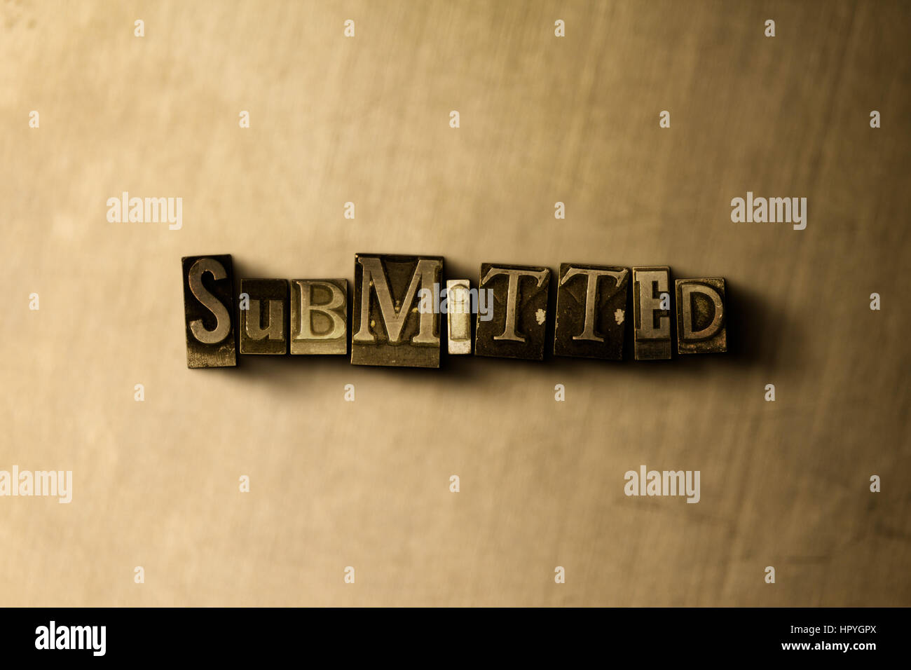 SUBMITTED - close-up of grungy vintage typeset word on metal backdrop ...