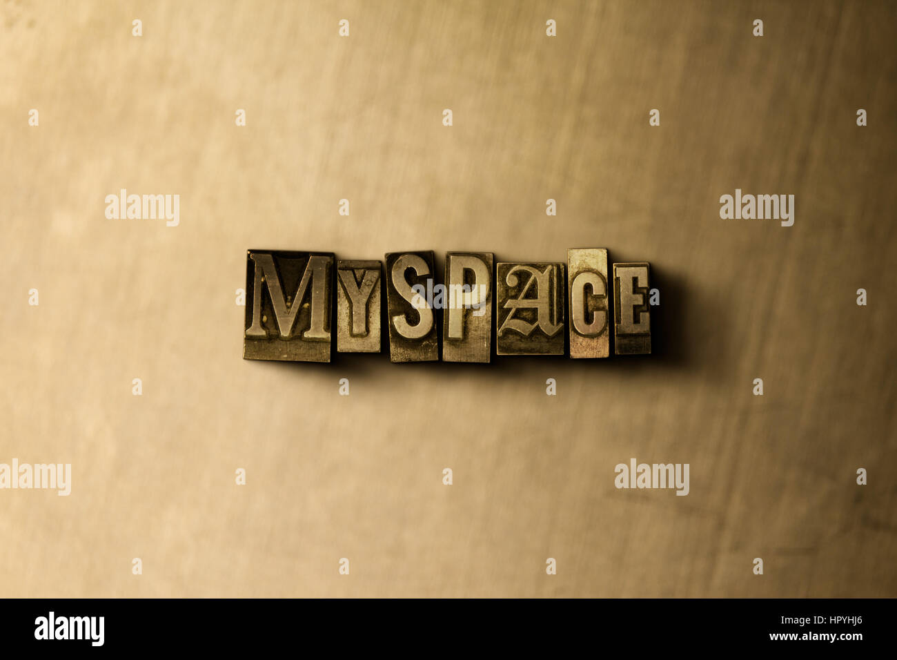 MYSPACE - close-up of grungy vintage typeset word on metal backdrop ...