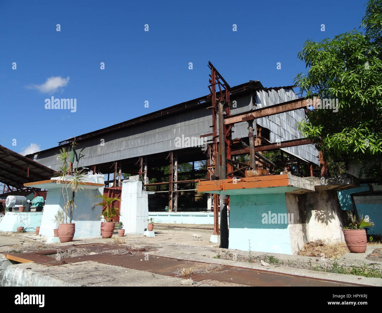 Disused sugar cane factory colourfully painted,Cuba Stock Photo - Alamy