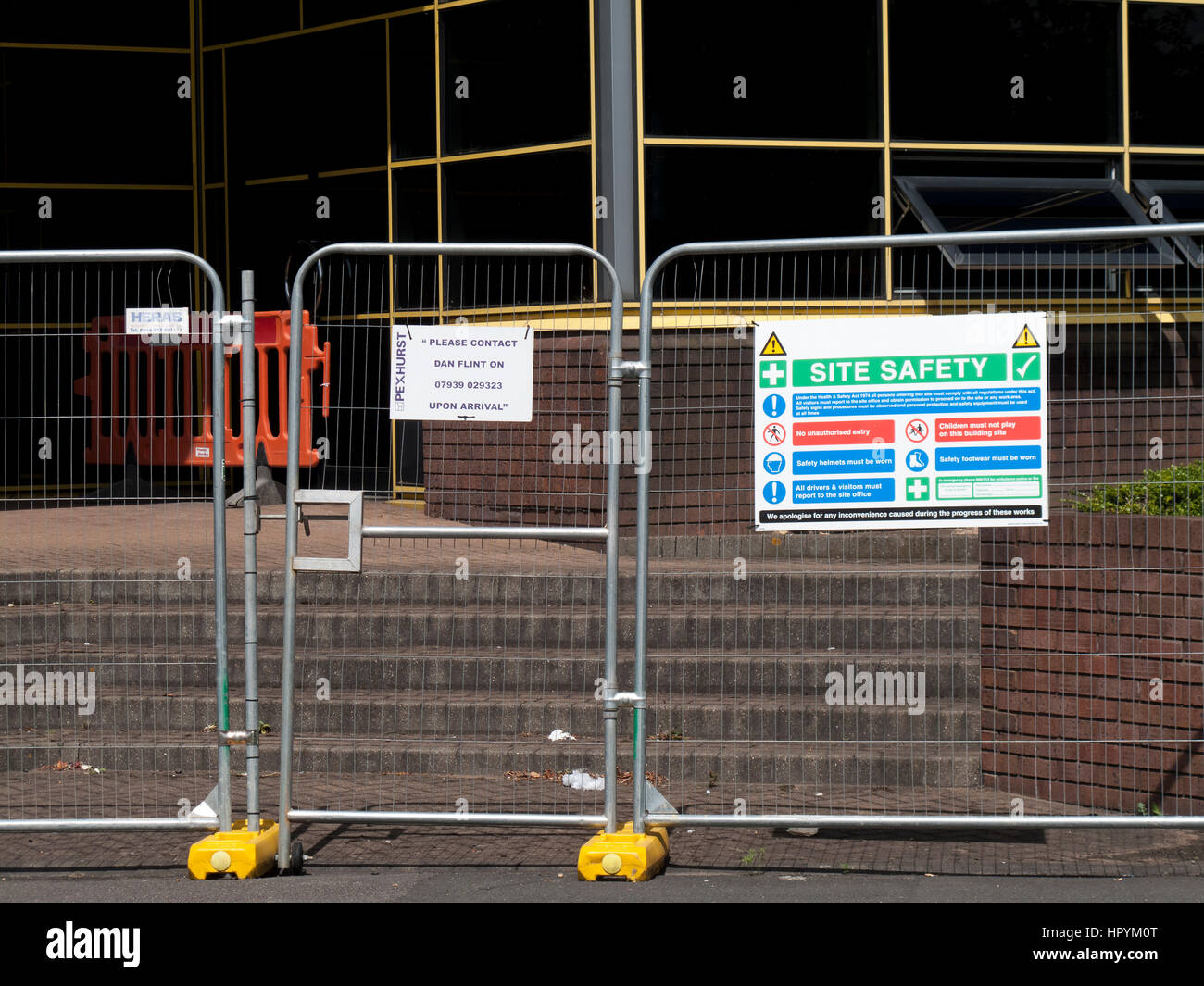 site safety sign and barriers to building site refurbishing warehouse ...