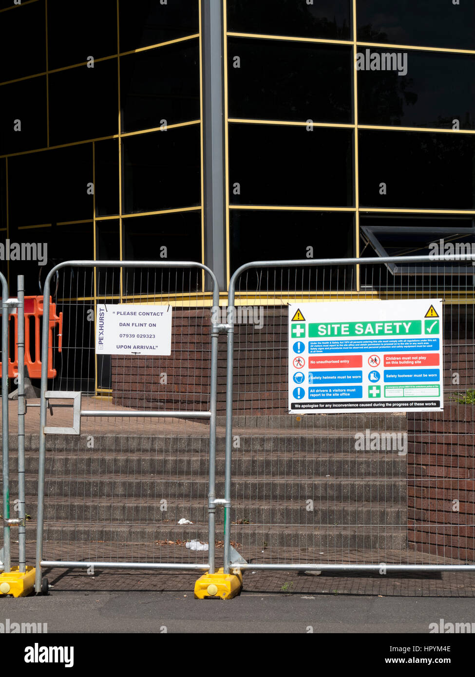 site safety sign and barriers to building site refurbishing warehouse ...