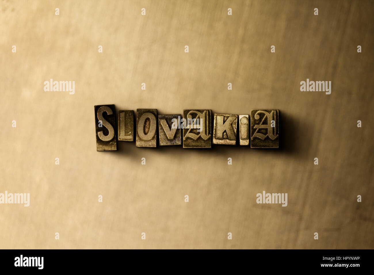 SLOVAKIA - close-up of grungy vintage typeset word on metal backdrop ...