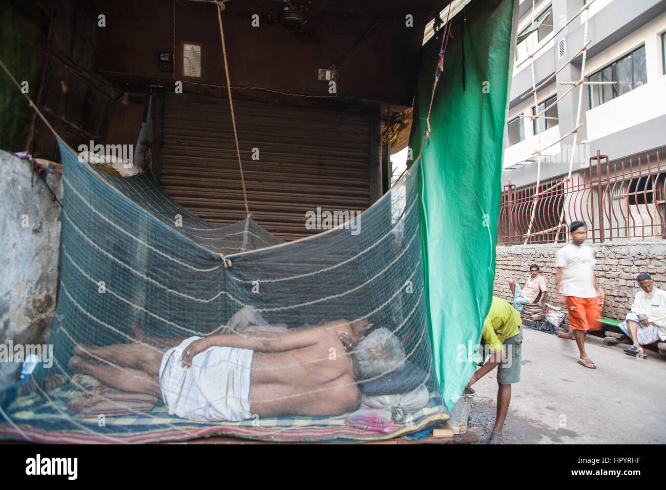 Sleeping Under Mosquito Net High Resolution Stock Photography and ...