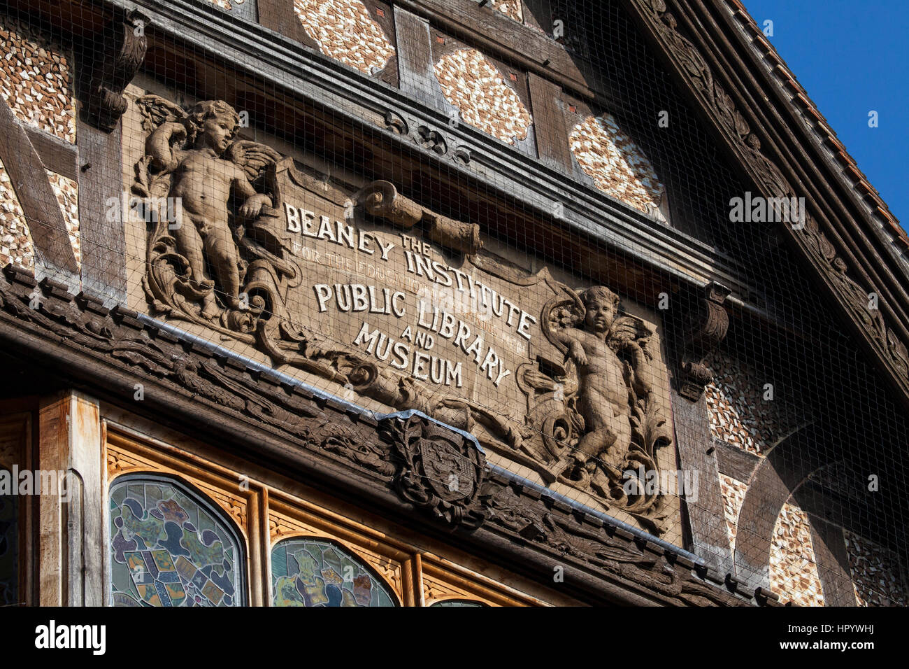 A close-up of the sculptured plaque on the facade of The Beaney House ...
