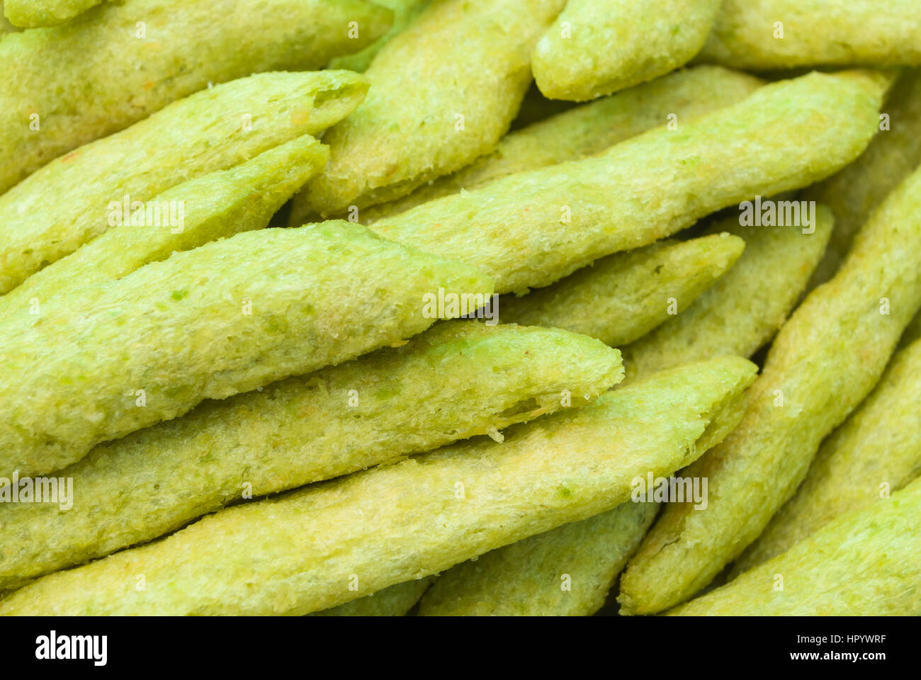 Closeup to Green Pea Flavor Crispy Snack Background Stock Photo - Alamy