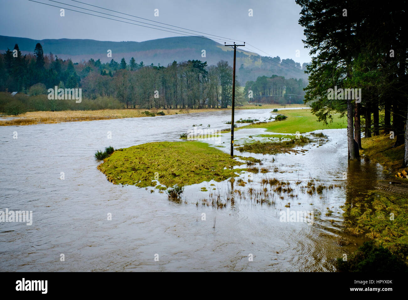 The River Tweed in flood in the Tweed valley between Broughton and ...