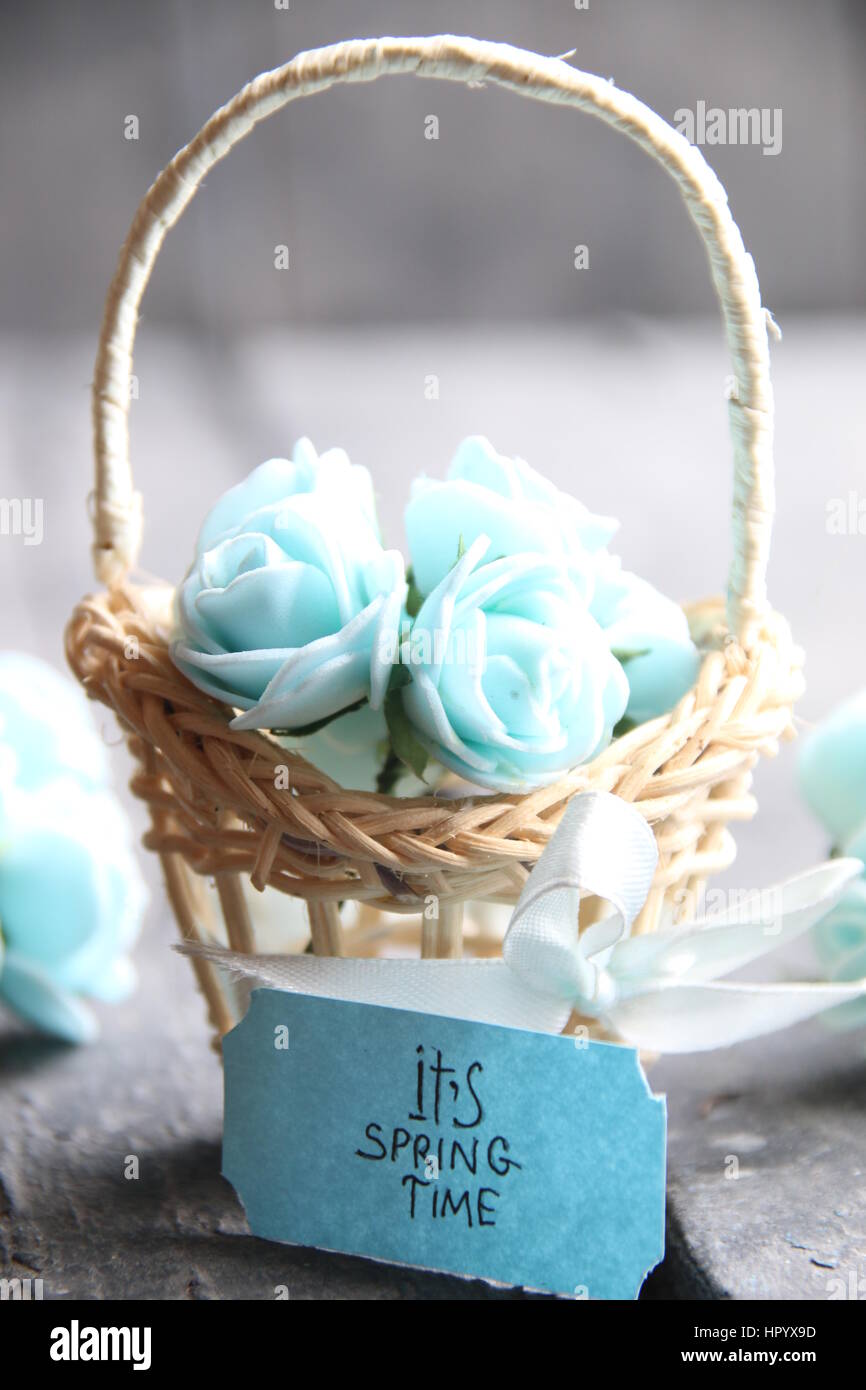 Bouquet of spring flowers in basket. Its spring Time Stock Photo - Alamy